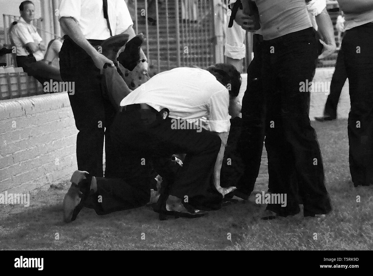 Football hooligans fighting england Black and White Stock Photos ...
