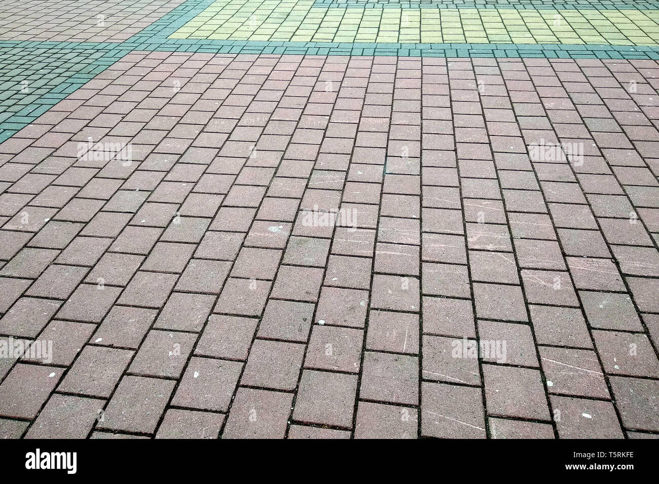 Stone pavement in perspective. Granite cobblestone pavement tiles Stock ...