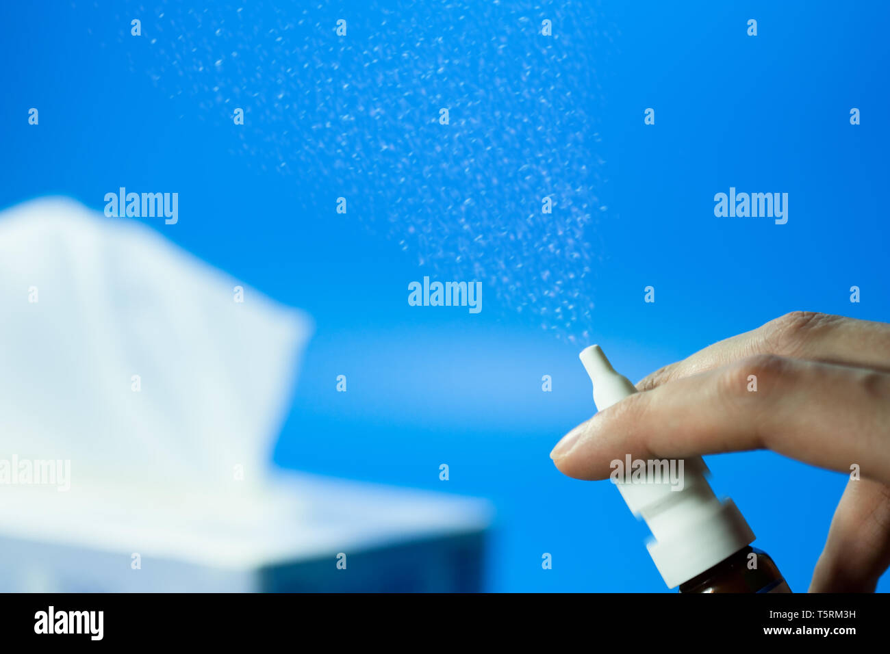 nasal spray and tissues - allergy and flu season concept Stock Photo ...