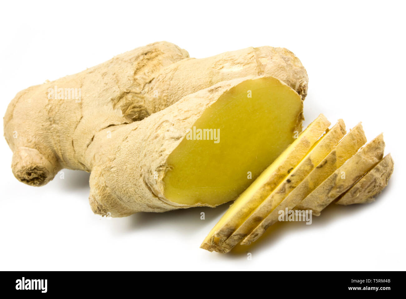 cut ginger root on white background Stock Photo - Alamy