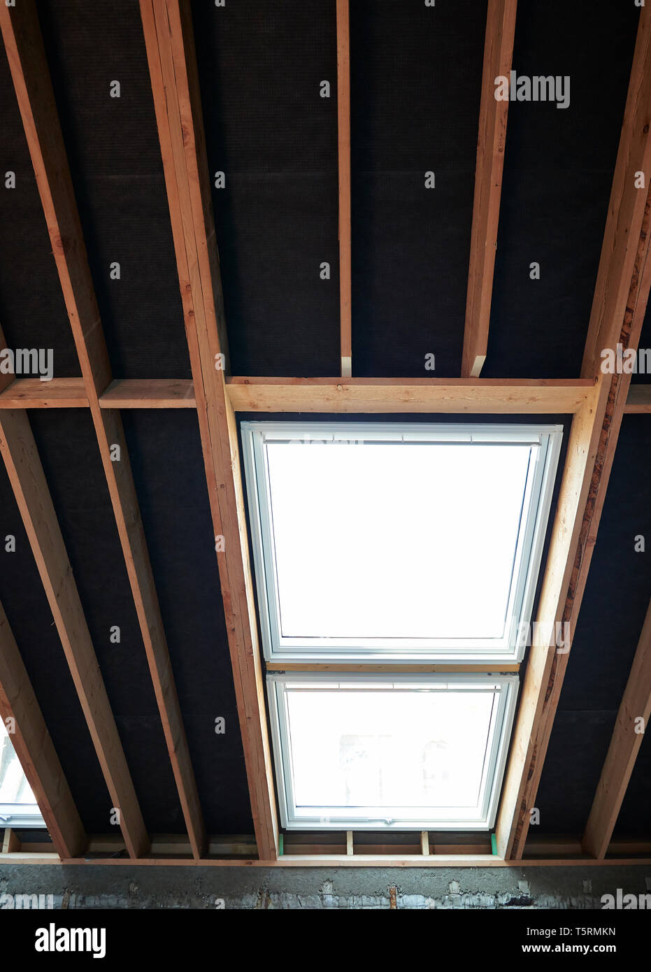 Attic and ceiling windows in renovated house under construction Stock ...