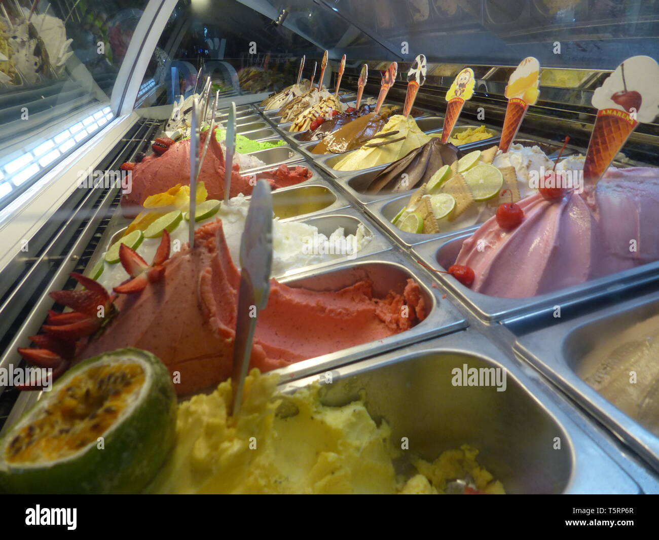 Various kinds of ice cream on display outside shop at Playa del Carmen ...