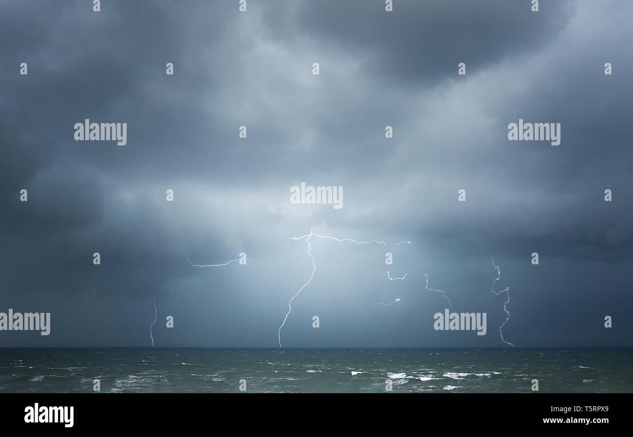 thunderstorm with lightning on the sea Stock Photo - Alamy