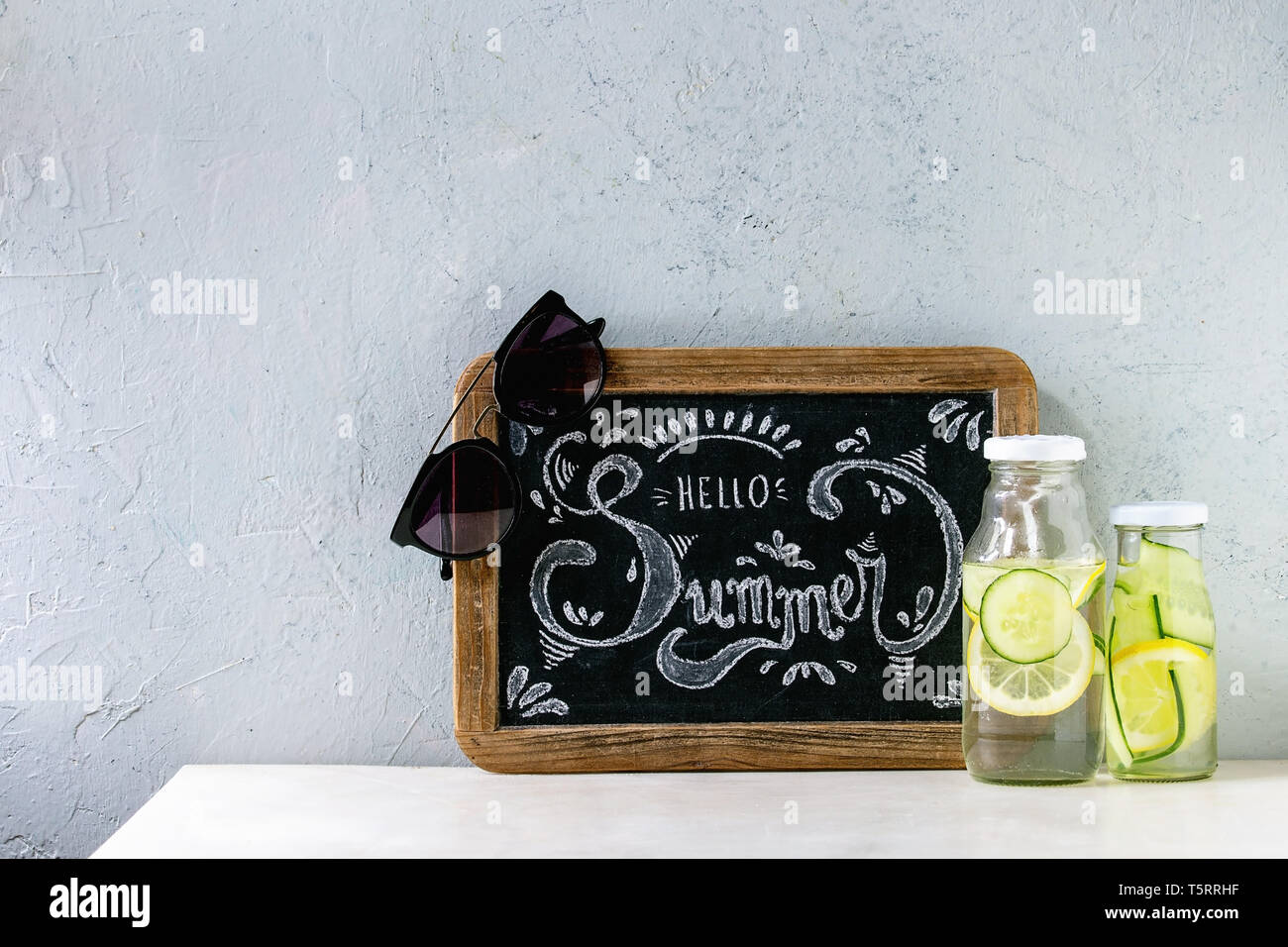 Summer theme on sand Stock Photo - Alamy