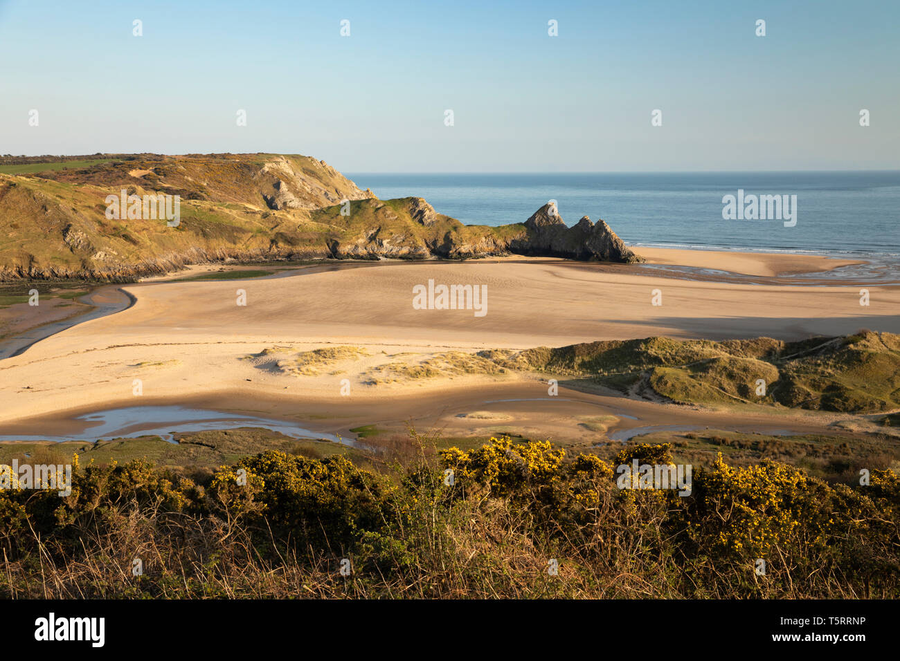 Three Cliffs Bay in warm evening light, Gower Peninsula, Swansea, West ...