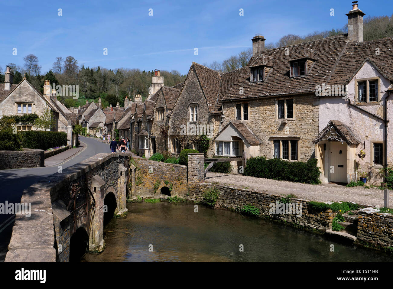 View of the river Bybrook and arched stone built bridge in Castle ...