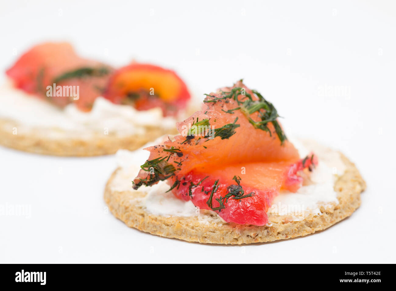 Slices of gravadlax from a fillet of rainbow trout, Oncorhynchus mykiss ...