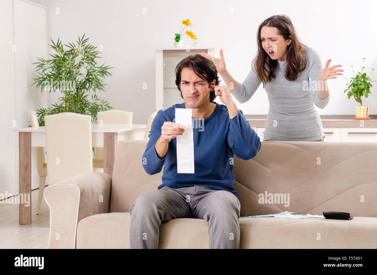 Couple arguing budget expenses hi-res stock photography and images - Alamy