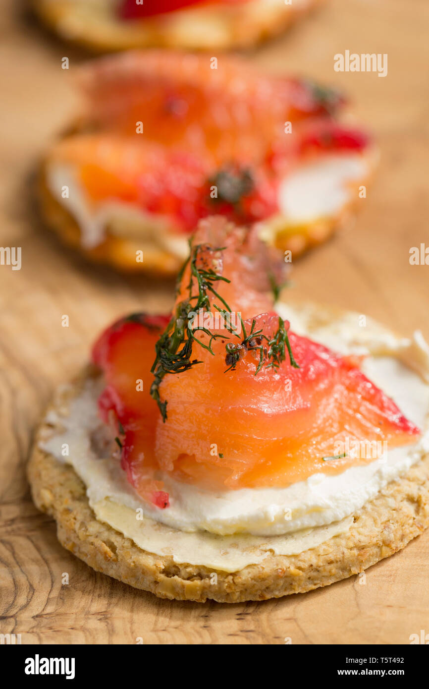 Slices of gravadlax from a fillet of rainbow trout, Oncorhynchus mykiss ...