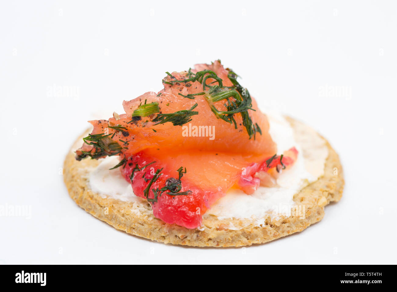 Slices of gravadlax from a fillet of rainbow trout, Oncorhynchus mykiss ...
