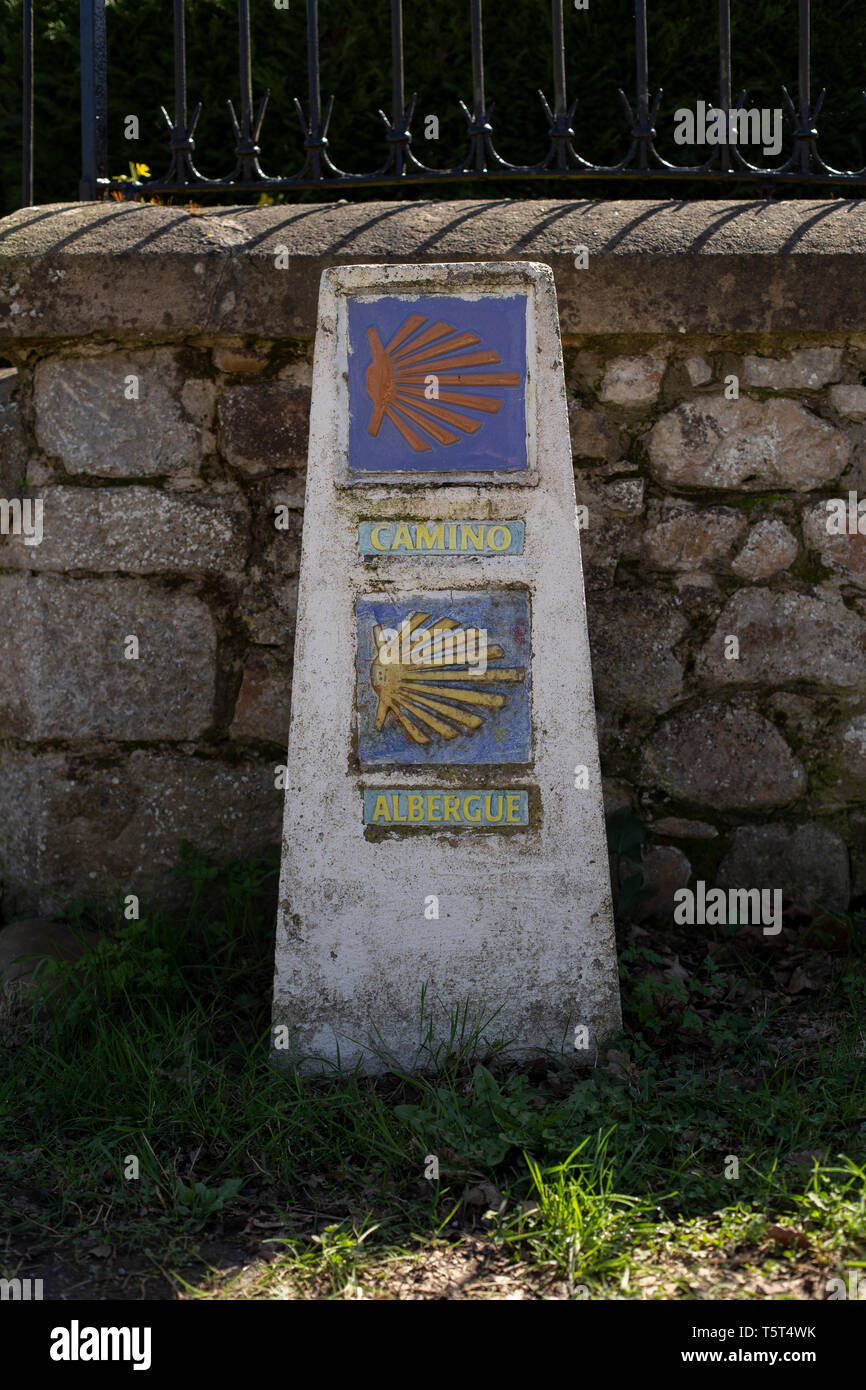 old stone with Camino sign Stock Photo - Alamy