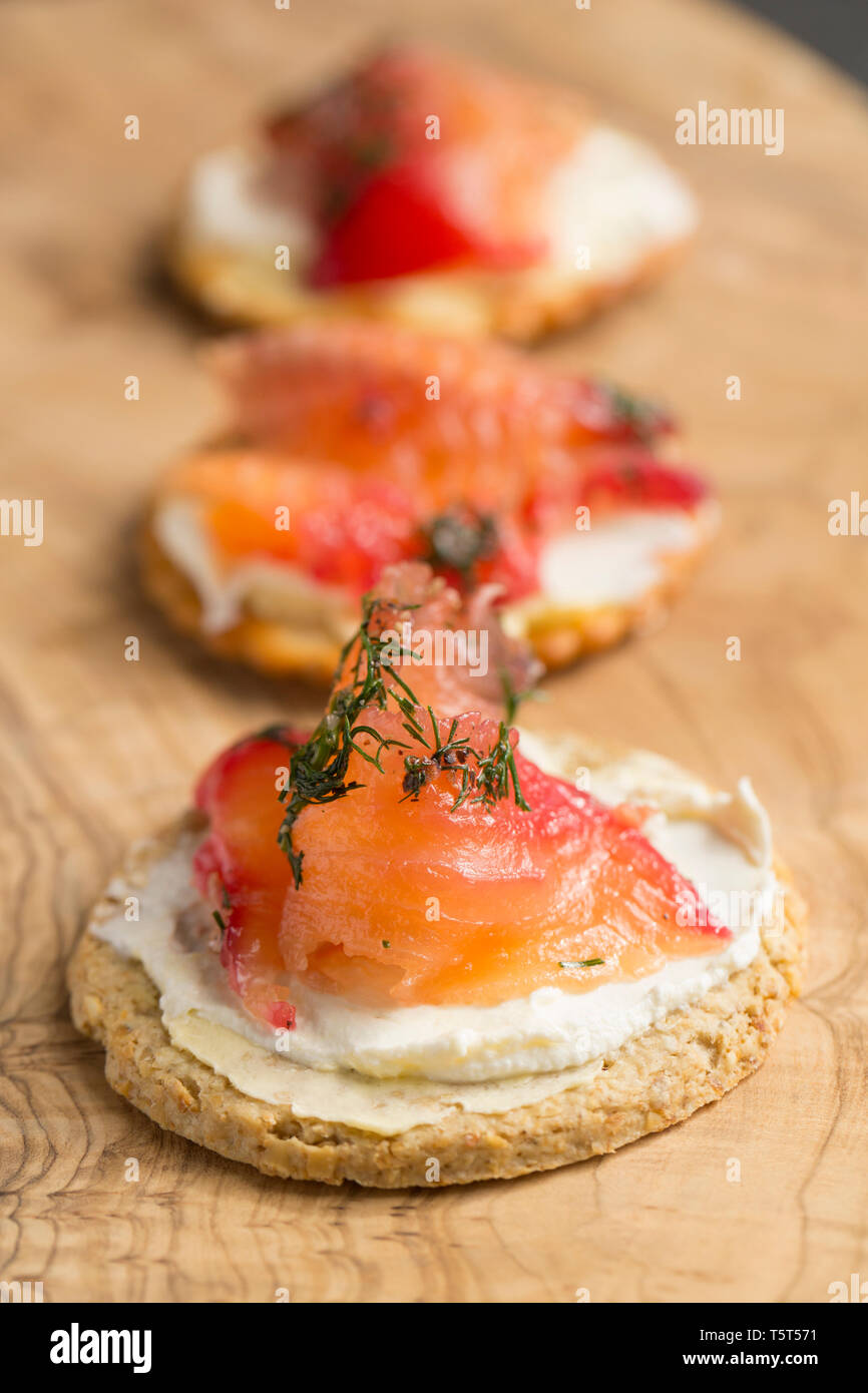 Slices of gravadlax from a fillet of rainbow trout, Oncorhynchus mykiss ...