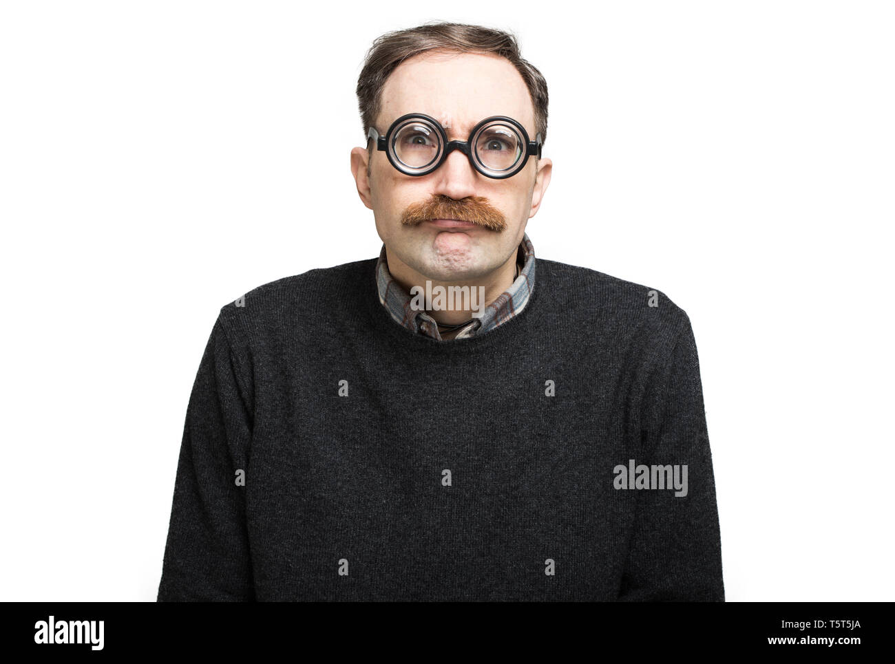 Funny portrait of a ner mand wearing nerd glasses Stock Photo - Alamy