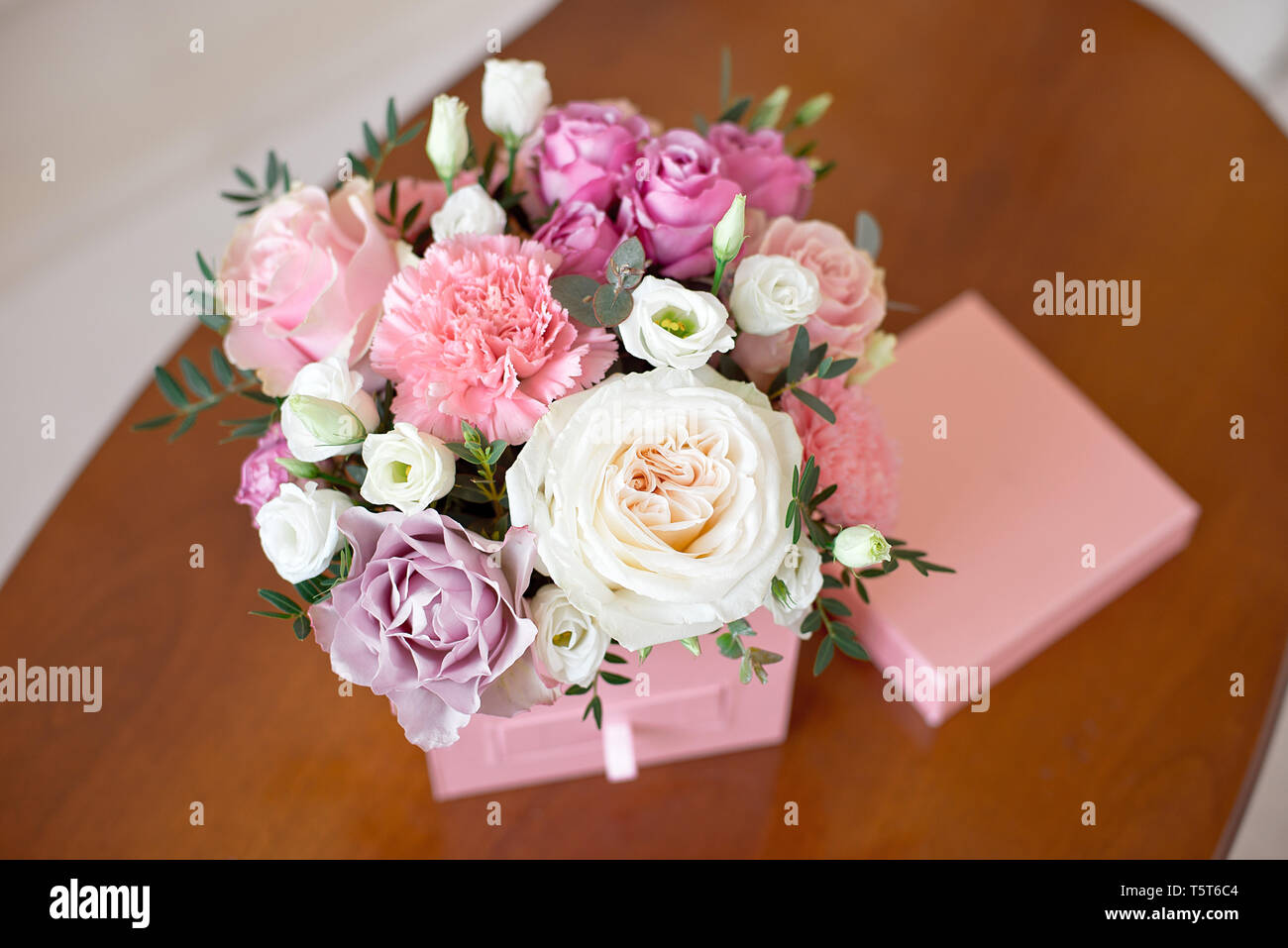 Square pink flower box with a secret department with a tile of home ...