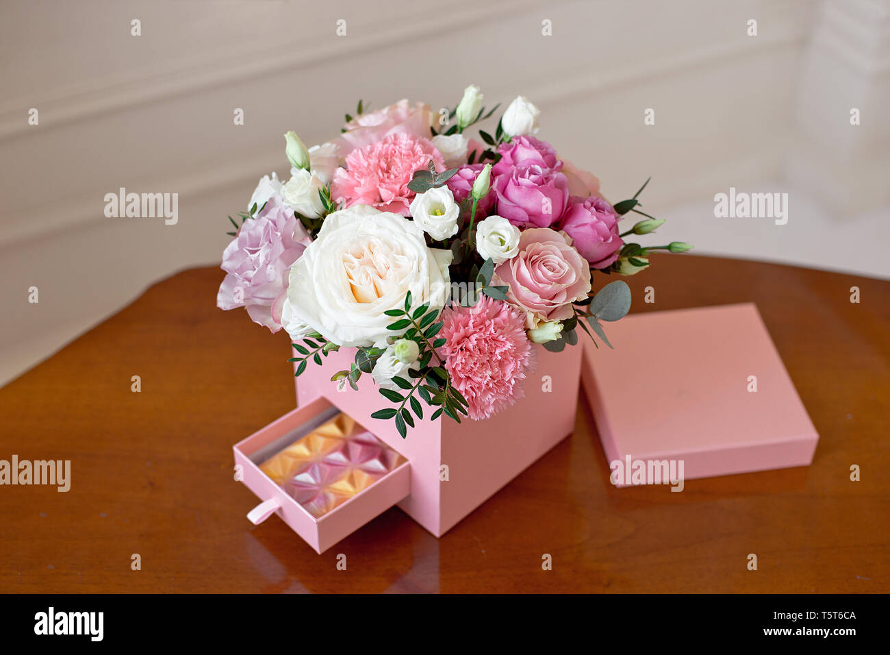 Square pink flower box with a secret department with a tile of home ...