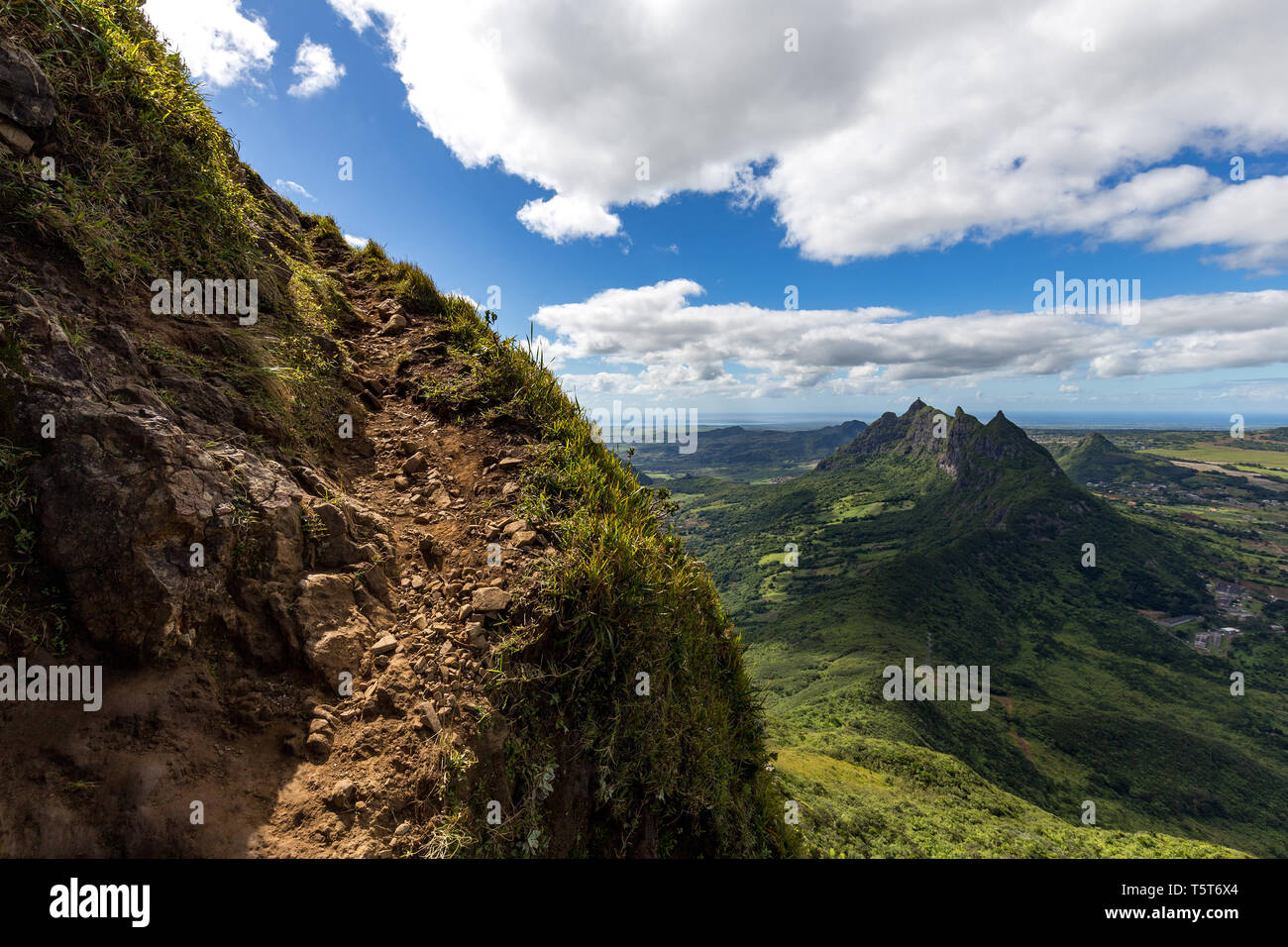 The trail up to the peak of the mountain Le Pouce on the island of ...