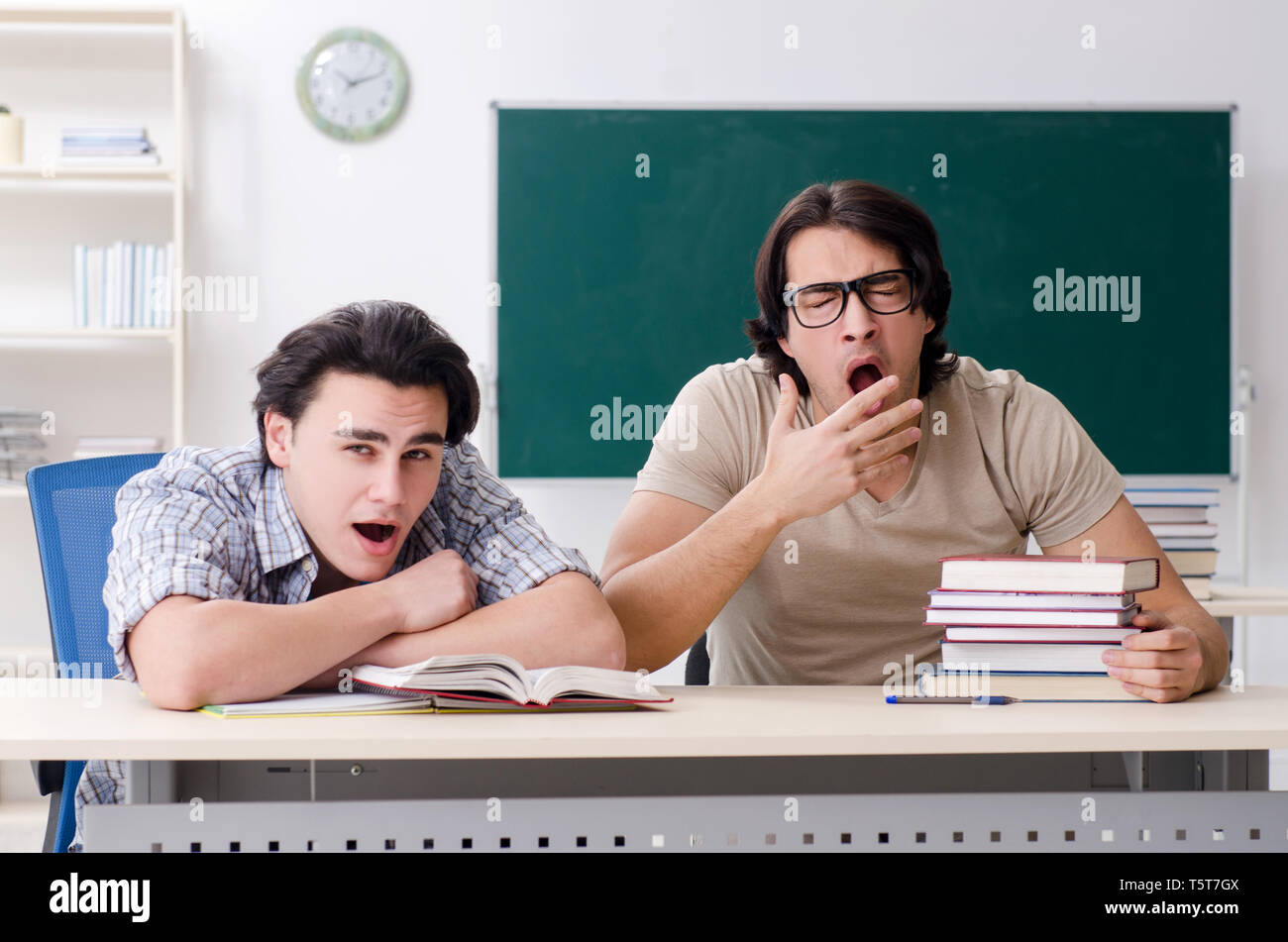 Two male students in the classroom Stock Photo - Alamy