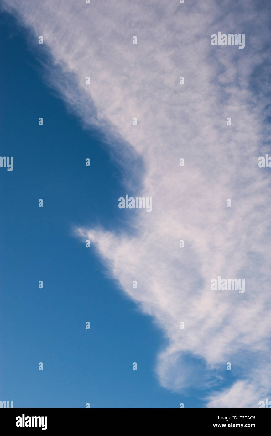 Cirrus clouds with unusual shapes in blue sky Stock Photo - Alamy