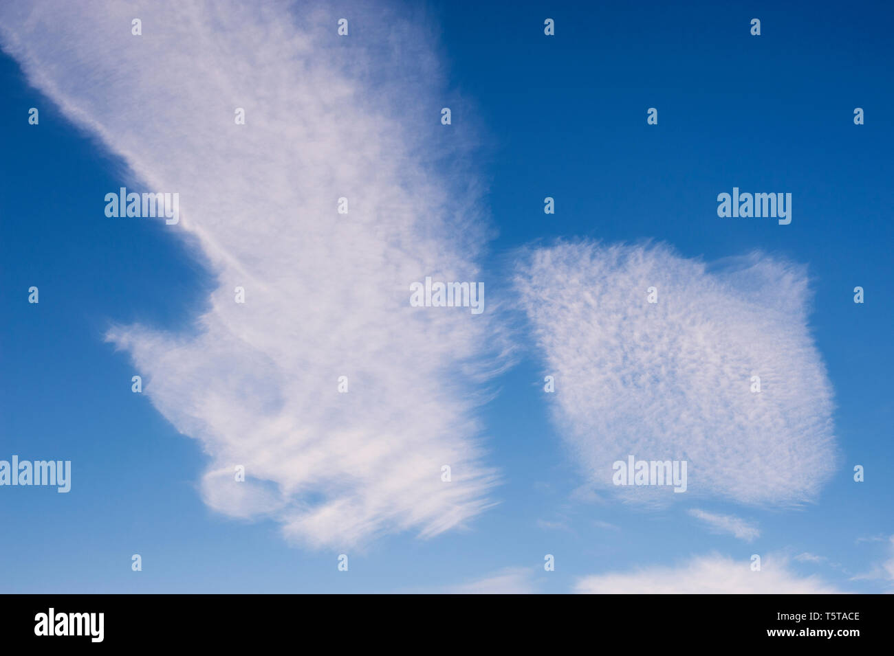 Cirrus clouds with unusual shapes in blue sky Stock Photo - Alamy