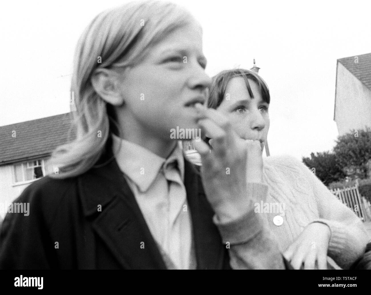 Anxiety showing on the girls faces during a sniper attack in ...