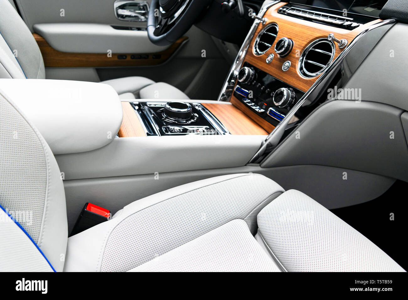 Modern luxury car white leather interior with natural wood panel. Part ...