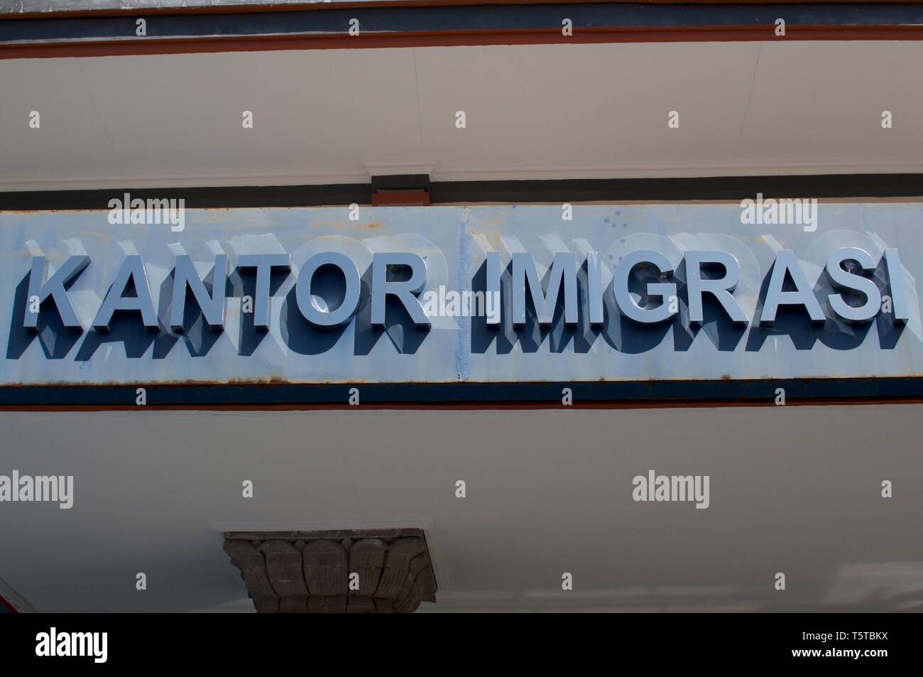 Close up picture of the text Kantor Imigrasi (Immigration Office) of ...