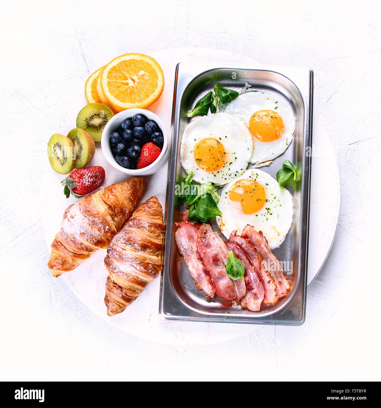 Table set for traditional breakfast. Top view Stock Photo - Alamy