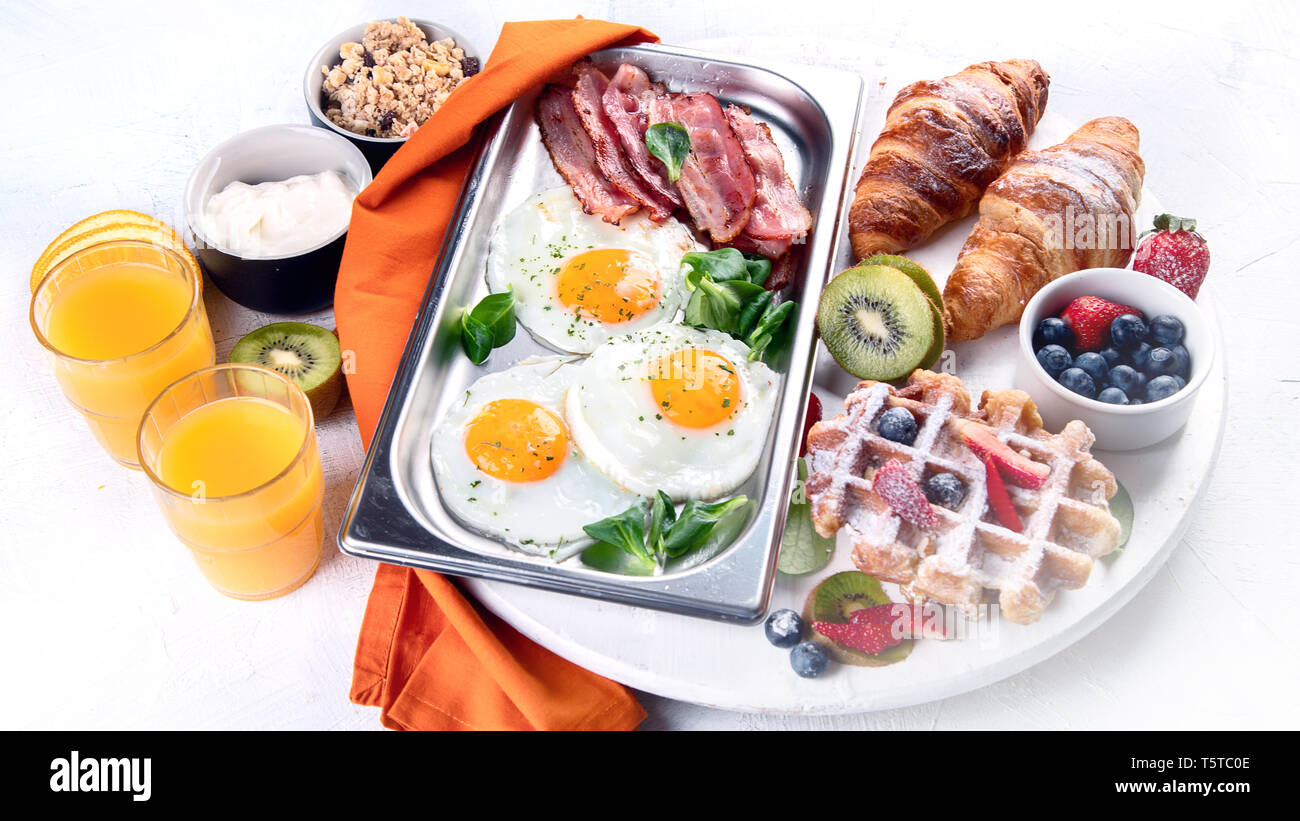 Table set for traditional breakfast Stock Photo - Alamy
