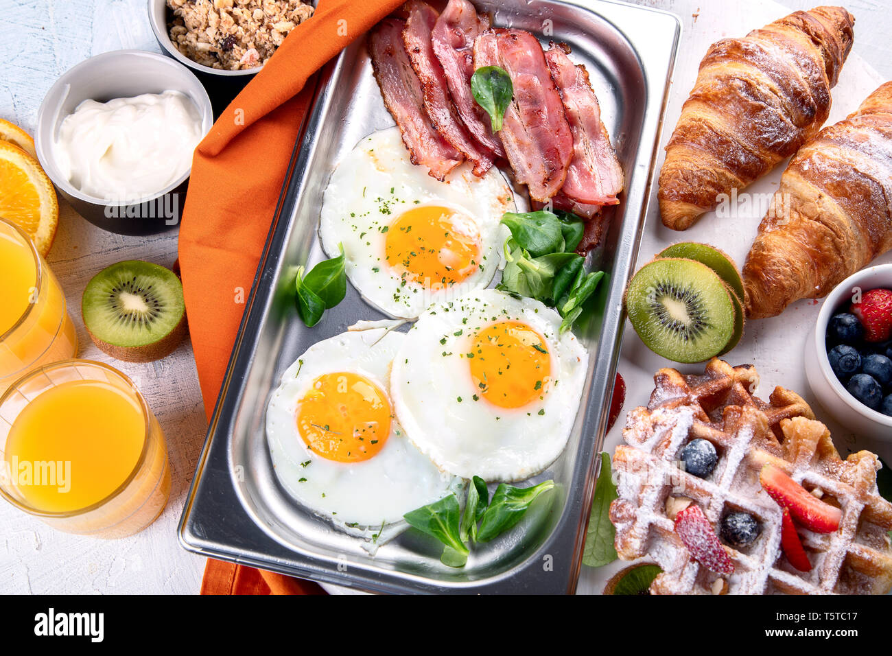 Table set for traditional breakfast. Top view Stock Photo - Alamy