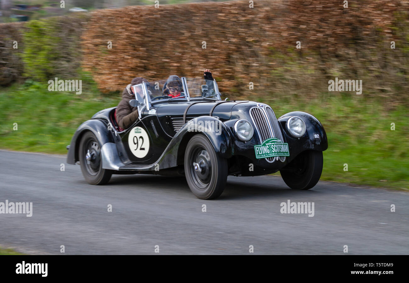 A 1938 Frazer Nash BMW 328 climbs Southwaite Hill in Cumbria, England ...