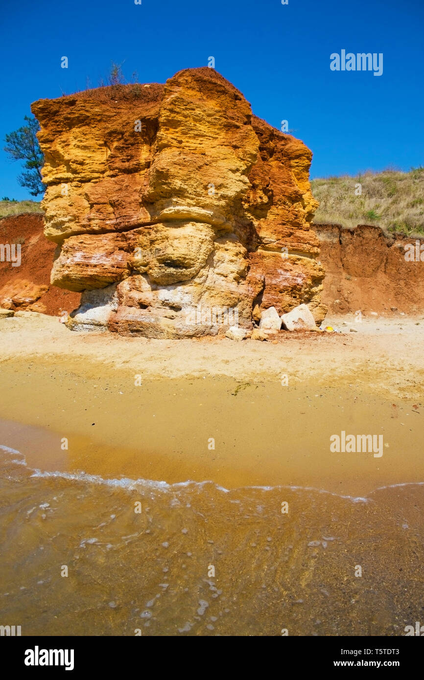 Mountain of clay and sea Stock Photo - Alamy