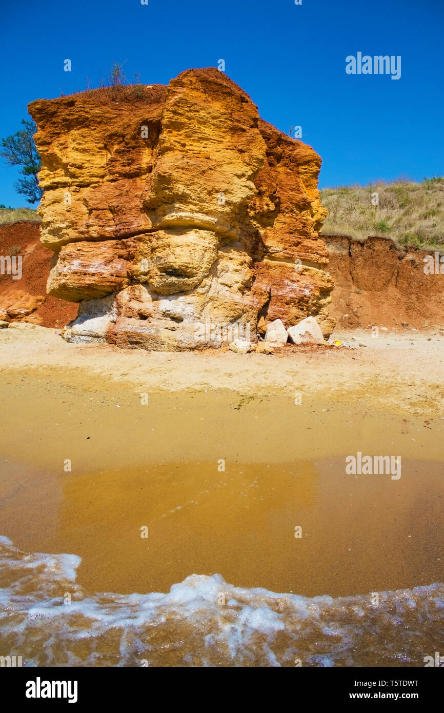 Mountain of clay and sea Stock Photo - Alamy
