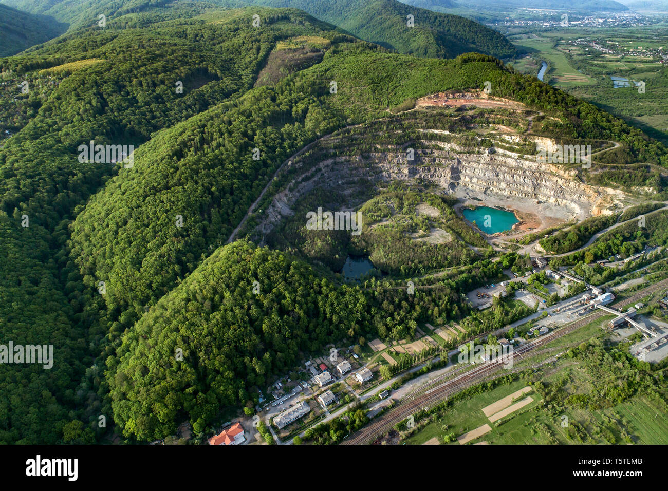 Quarry for the extraction of stone and sand Stock Photo - Alamy