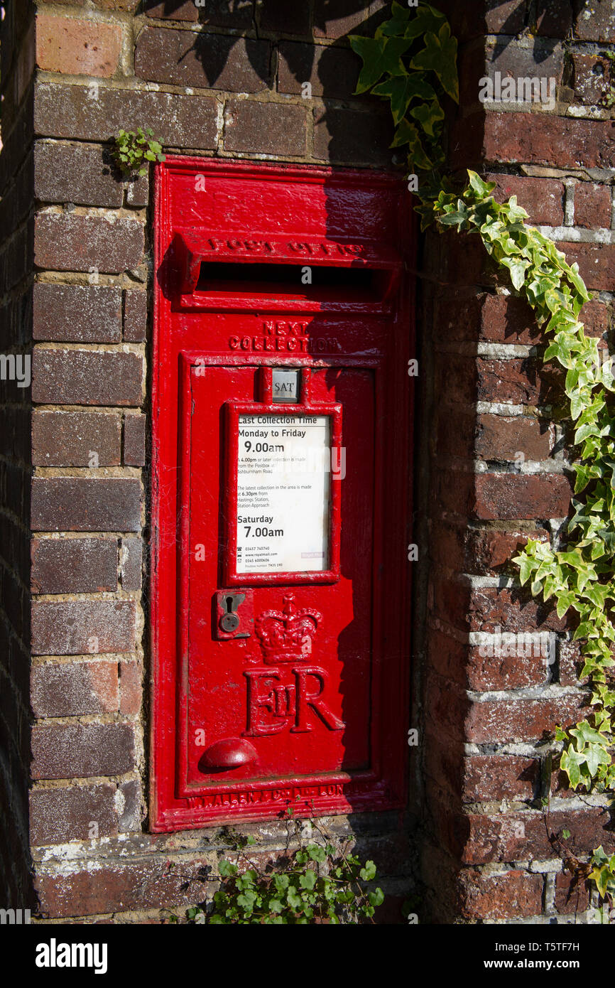 old-fashioned red postbox in wall Stock Photo - Alamy