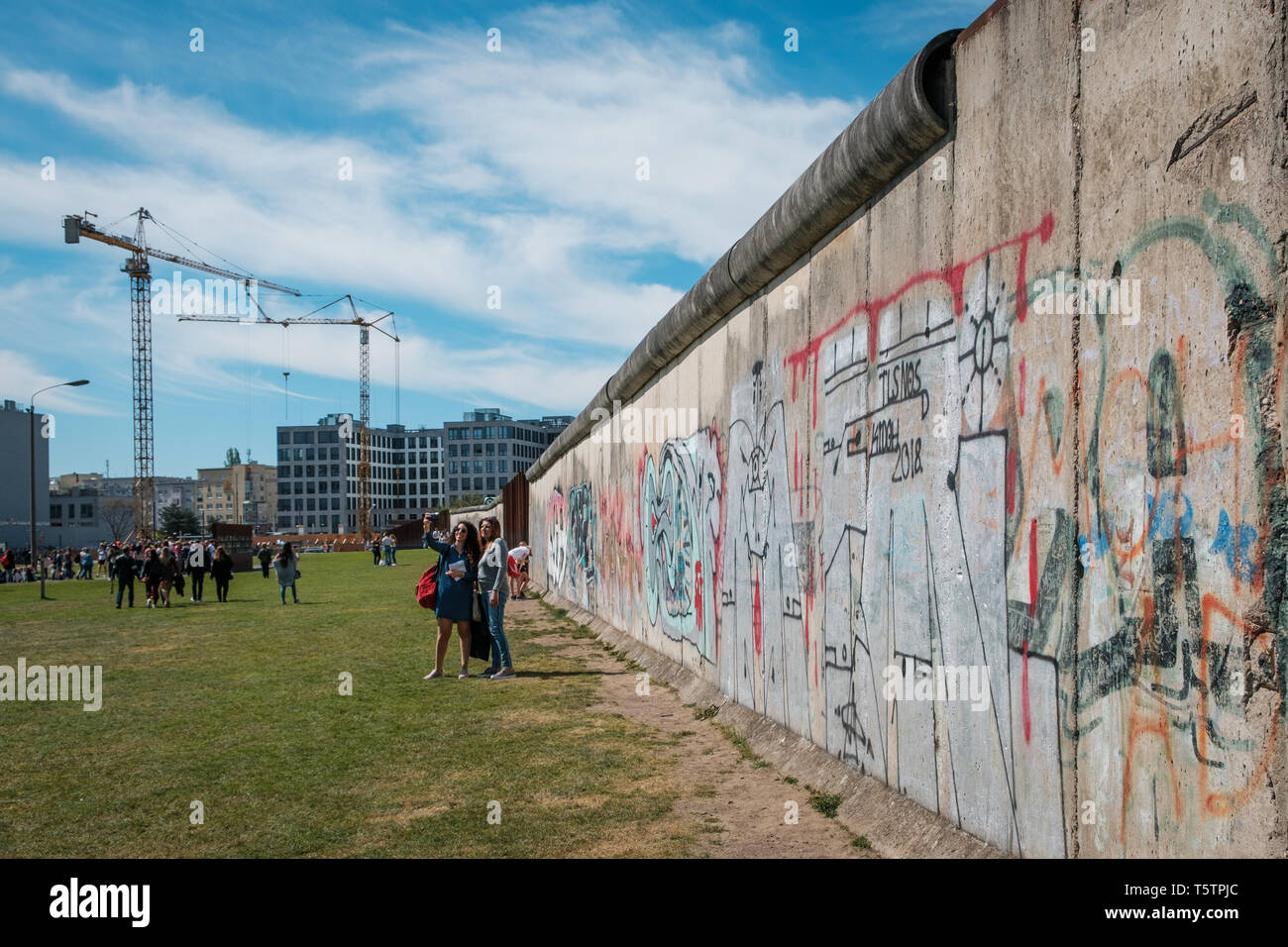 Berlin, Germany - April, 2019: Two tourist girls taking selfie picture ...