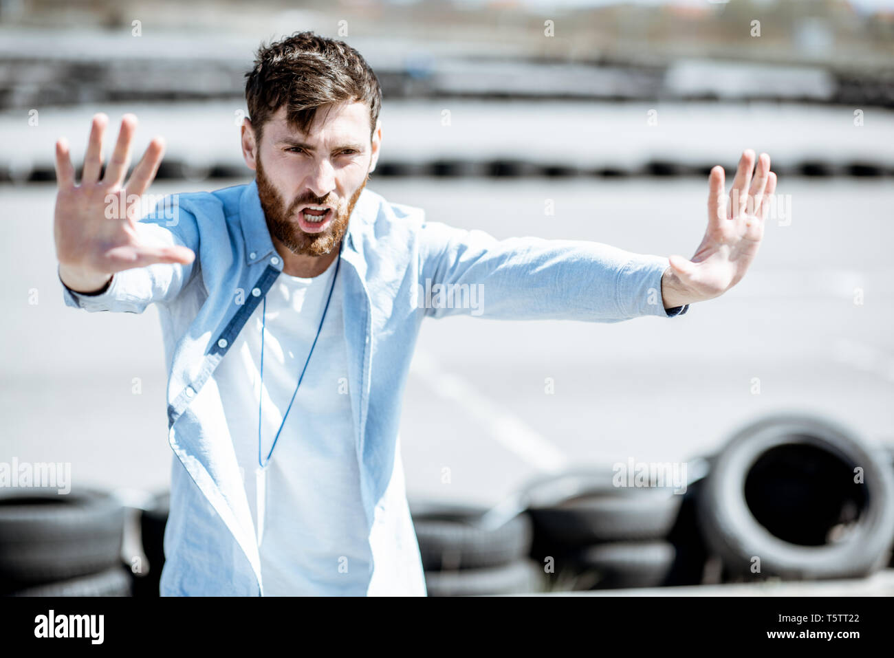 Hands stopping man hi-res stock photography and images - Alamy