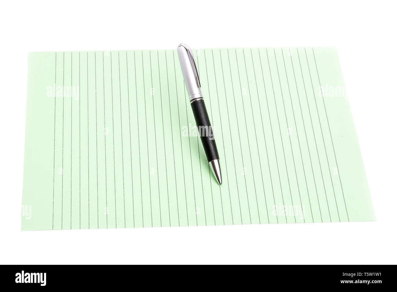 Pen and color paper on an isolated background Stock Photo - Alamy