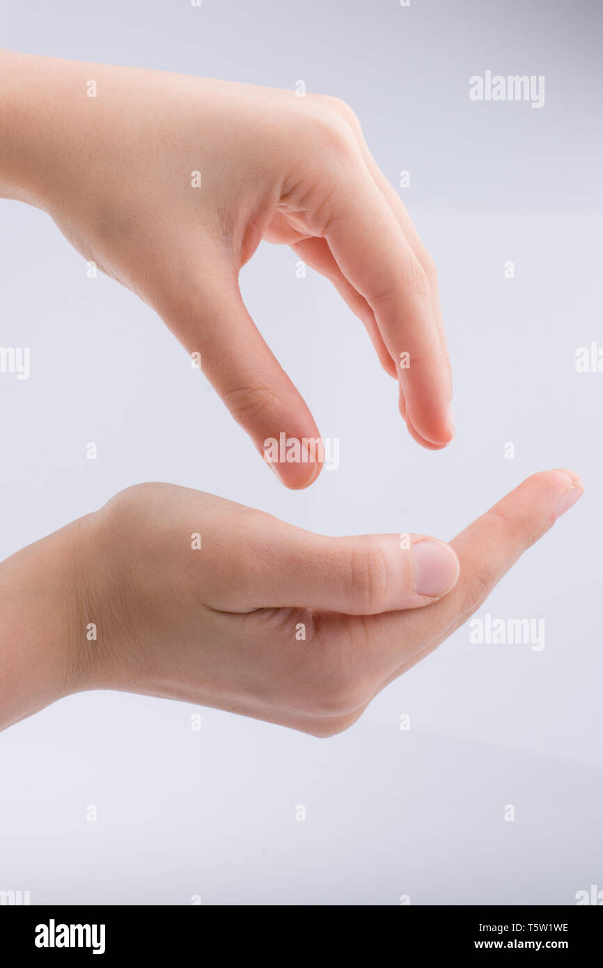 Hand holding on a white background Stock Photo - Alamy