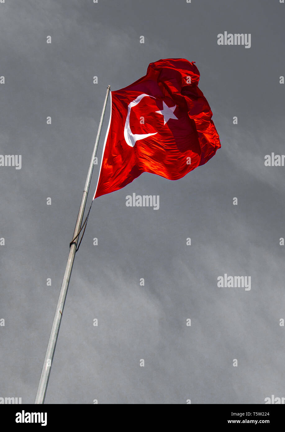 Turkish national flag hang on a pole in open air Stock Photo - Alamy