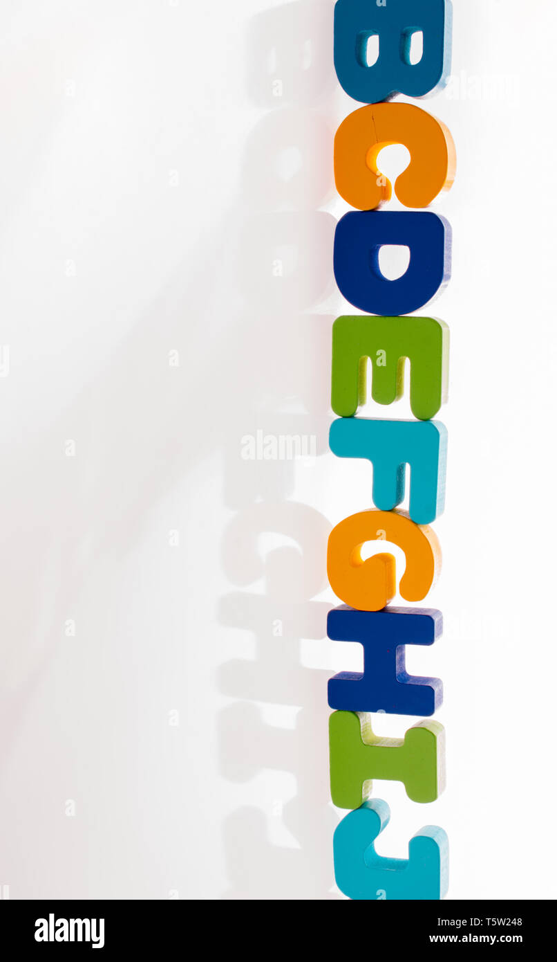 Letter cubes of Alphabet made of wood Stock Photo - Alamy