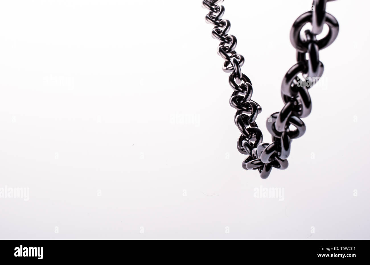 metal chain on white background Stock Photo - Alamy