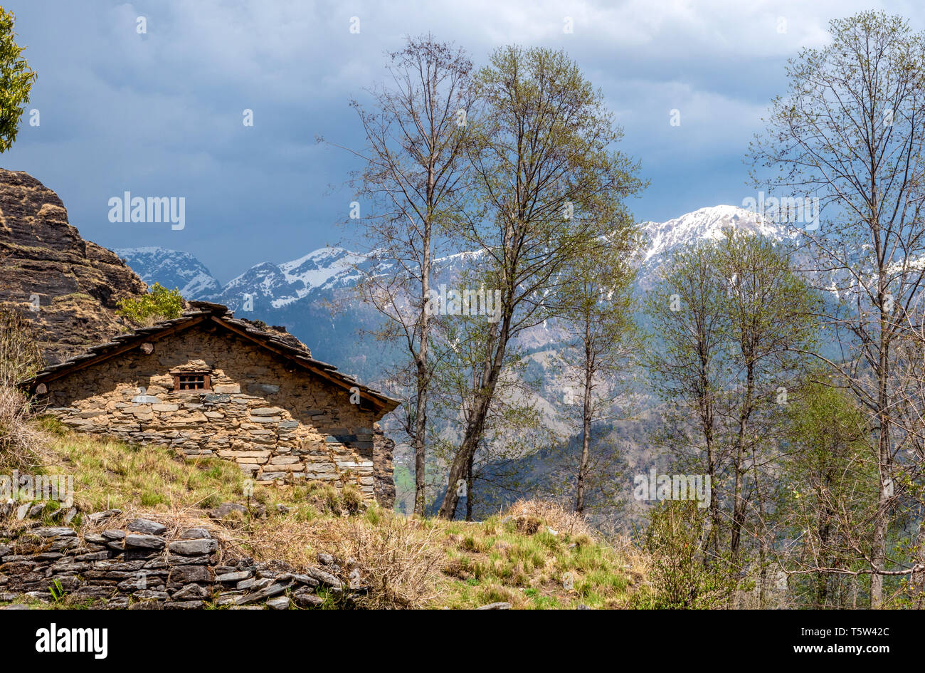 Stone farm building on an alpine farm high above the village of Supi in ...