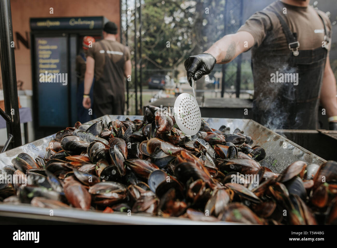 mollusks and meat on the street Stock Photo - Alamy