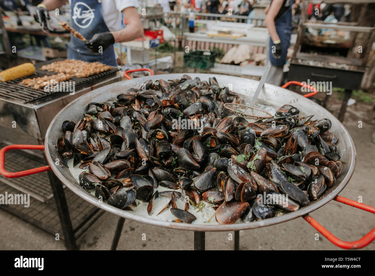 mollusks and meat on the street Stock Photo - Alamy