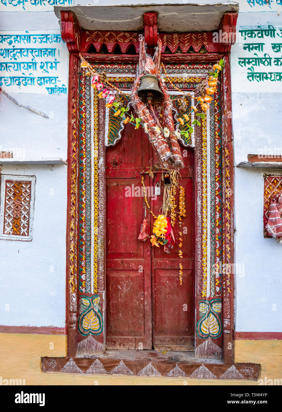 Elaborately decorated doors and windows of the principal house in Supi ...