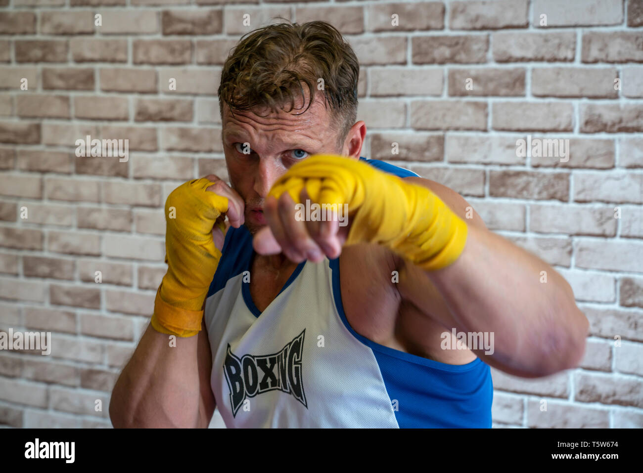 Boxer Boxing with your hands tied bandages on camera Stock Photo - Alamy