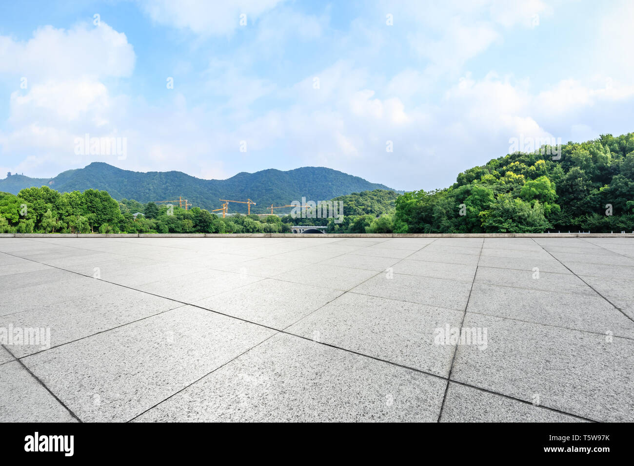 Empty square floor and green mountain with sky landscape Stock Photo ...