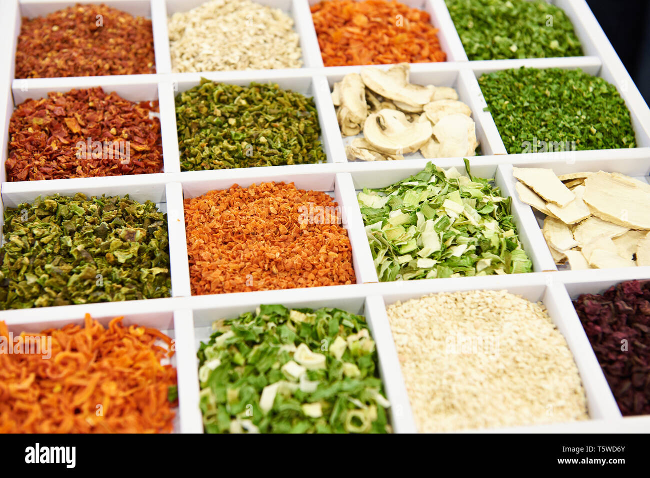 Dried seasoning vegetables and mushrooms on the counter of store Stock ...