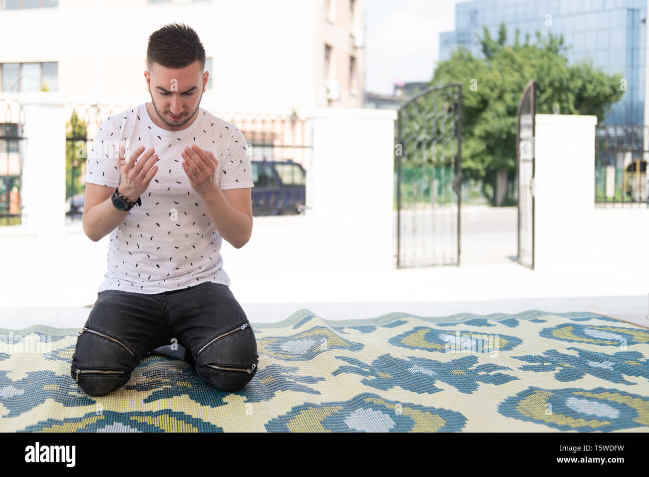 Attractive Man Making Traditional Prayer to God Allah Outdoors at Front ...