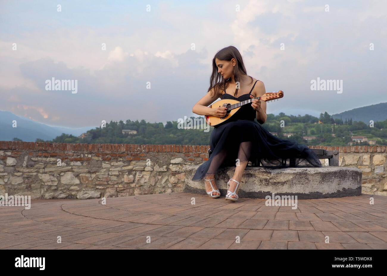 Musician posing with beautiful italian mandolin Stock Photo - Alamy